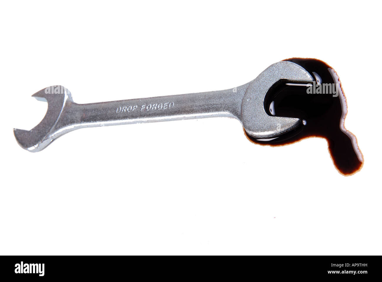 Spanner and oil Stock Photo - Alamy