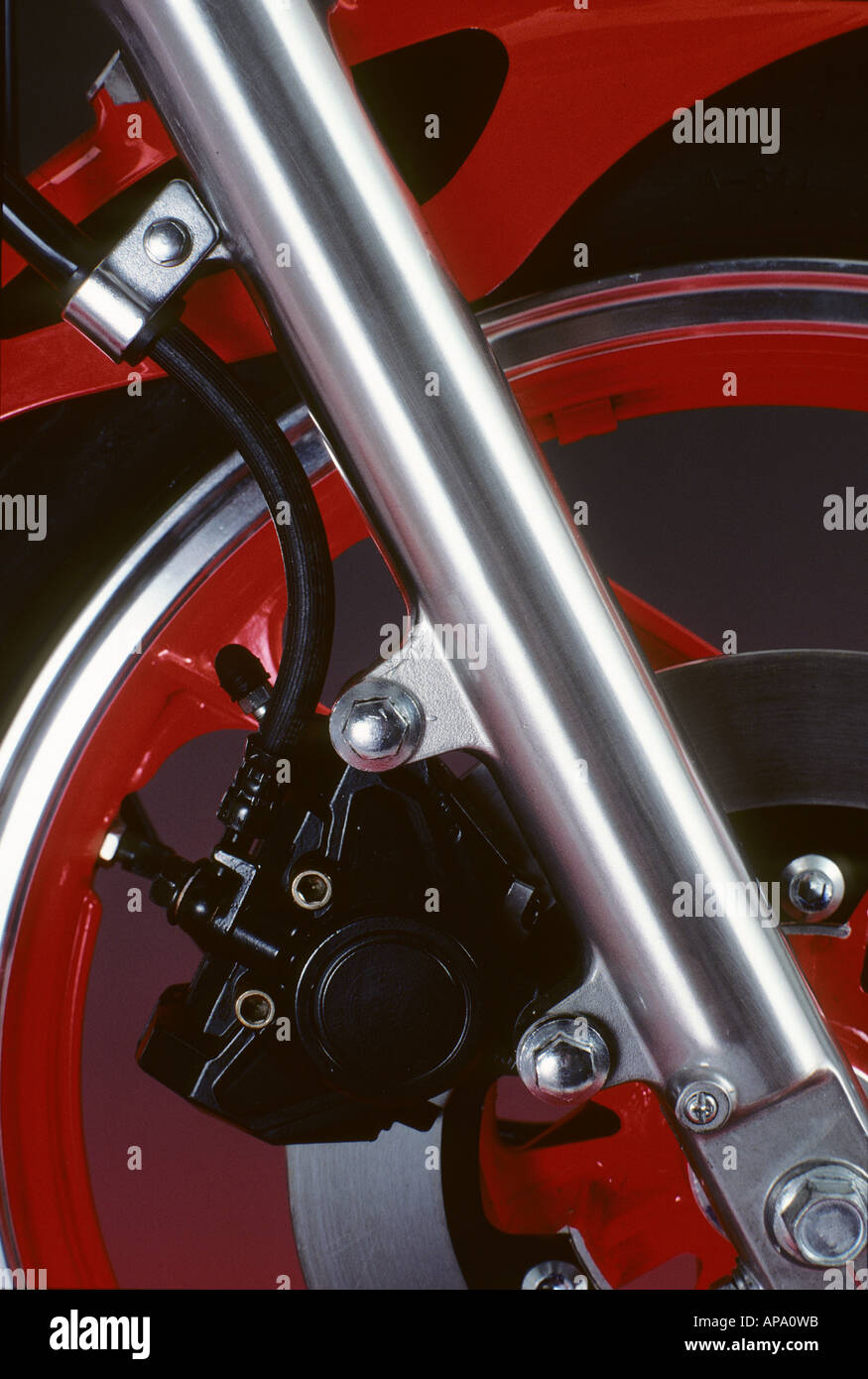 Details of motorbike front end taken in studio with a blank background ...
