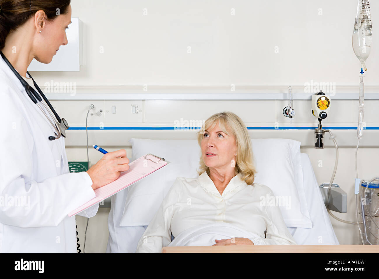 Doctor and patient Stock Photo - Alamy