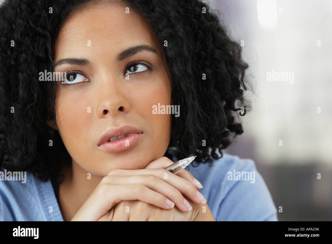 African businesswoman thinking Stock Photo - Alamy