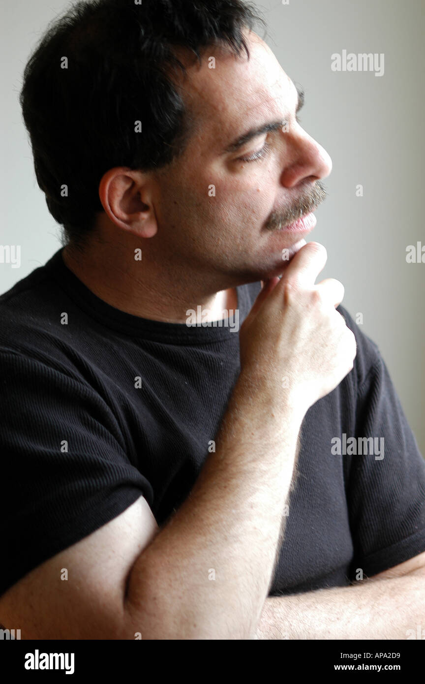 Portrait of a man with a worrisome look on his face Stock Photo - Alamy