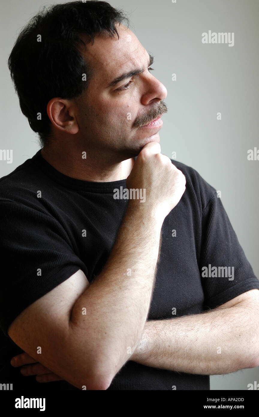 Portrait of a man with a worrisome look on his face Stock Photo - Alamy