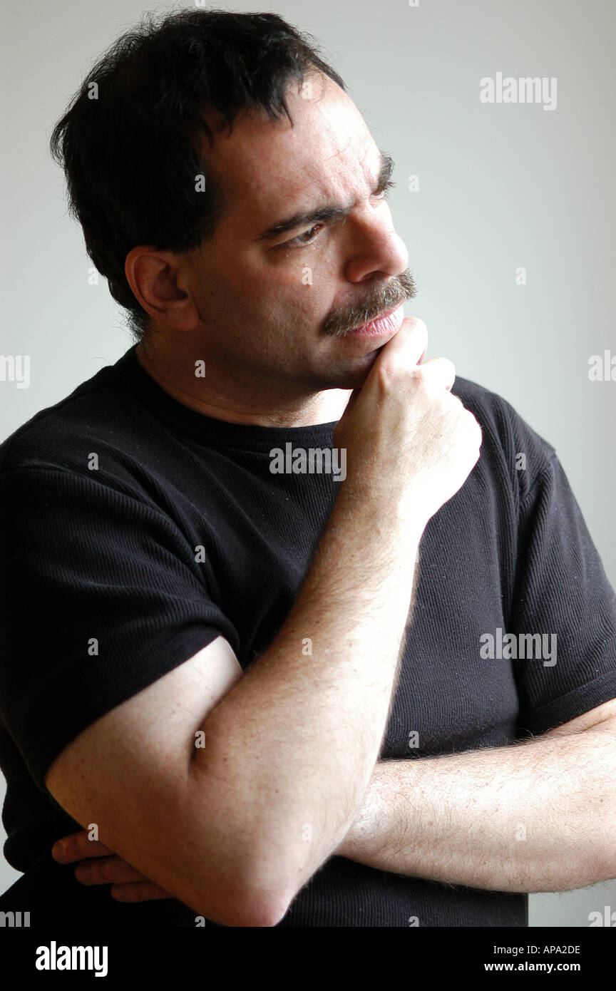Portrait of a man with a worrisome look on his face Stock Photo - Alamy