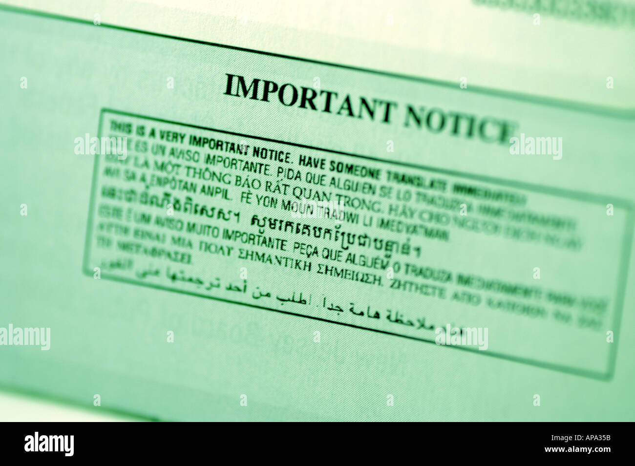 IMPORTANT NOTICE with fine print in box below green hue Stock Photo - Alamy