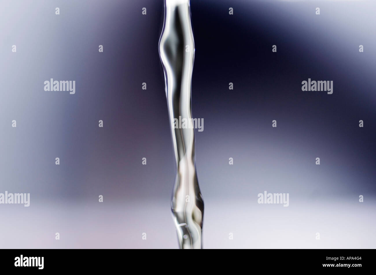 Water flowing from a tap Stock Photo - Alamy