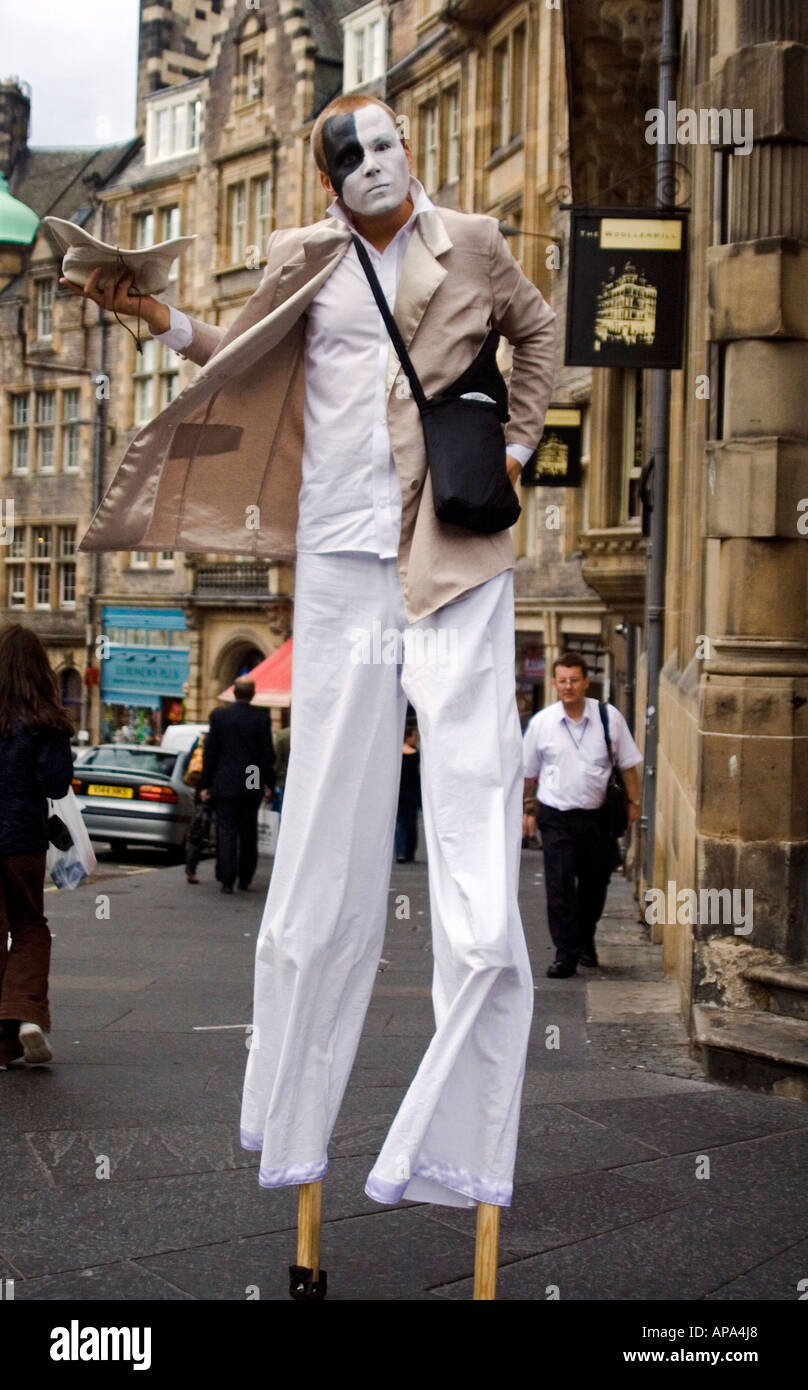 A mime artist walking on stilts at the Edinburgh festival fringe Royal ...