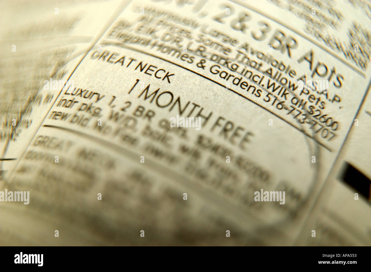 Close up newspaper ad 1 MONTH FREE Horizontal Stock Photo - Alamy