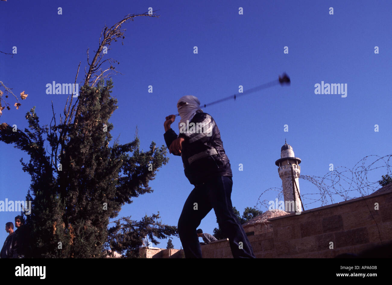 Palestinian intifada throwing stones hi-res stock photography and ...