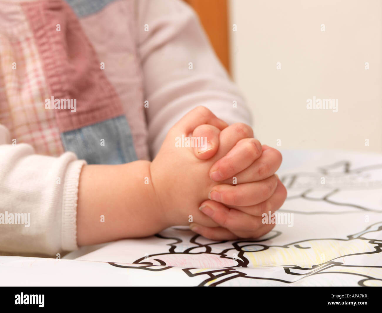 Close Up of Two Year old Girls Clasped Hands Stock Photo - Alamy