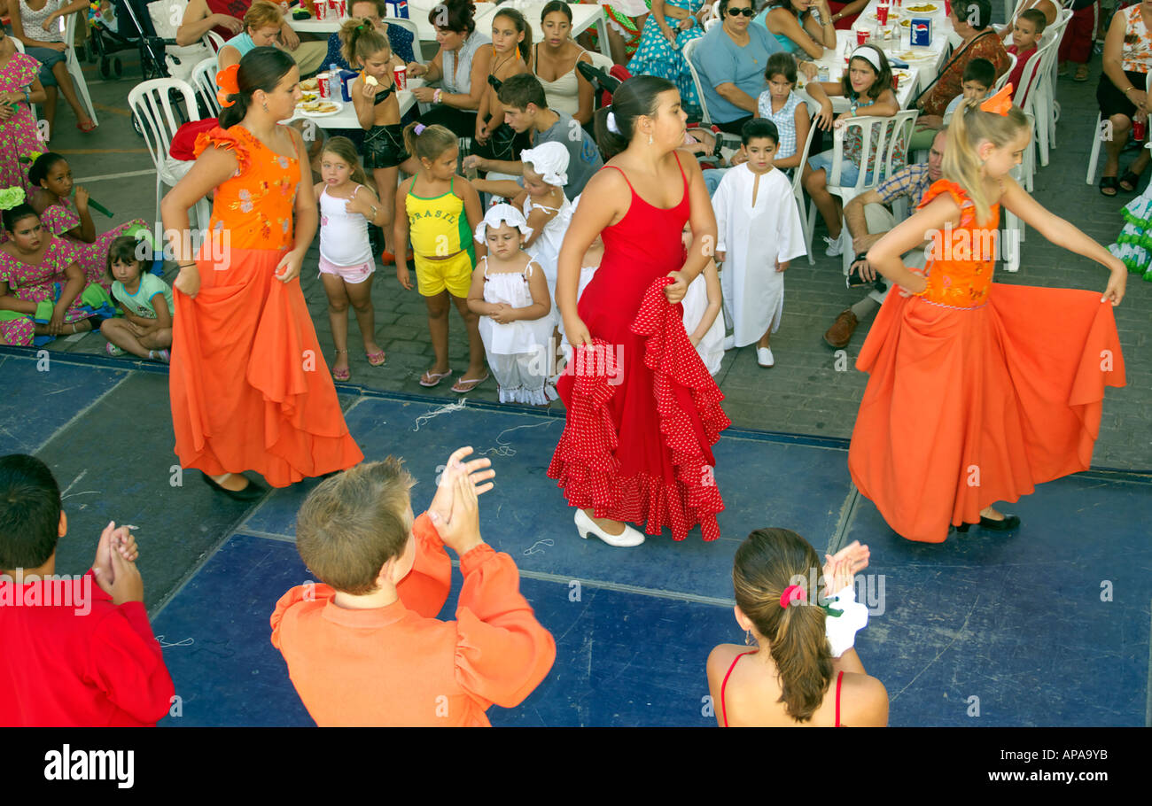 Young flamenco dancers at the feria, Mijas, Malaga, Costa del Sol ...