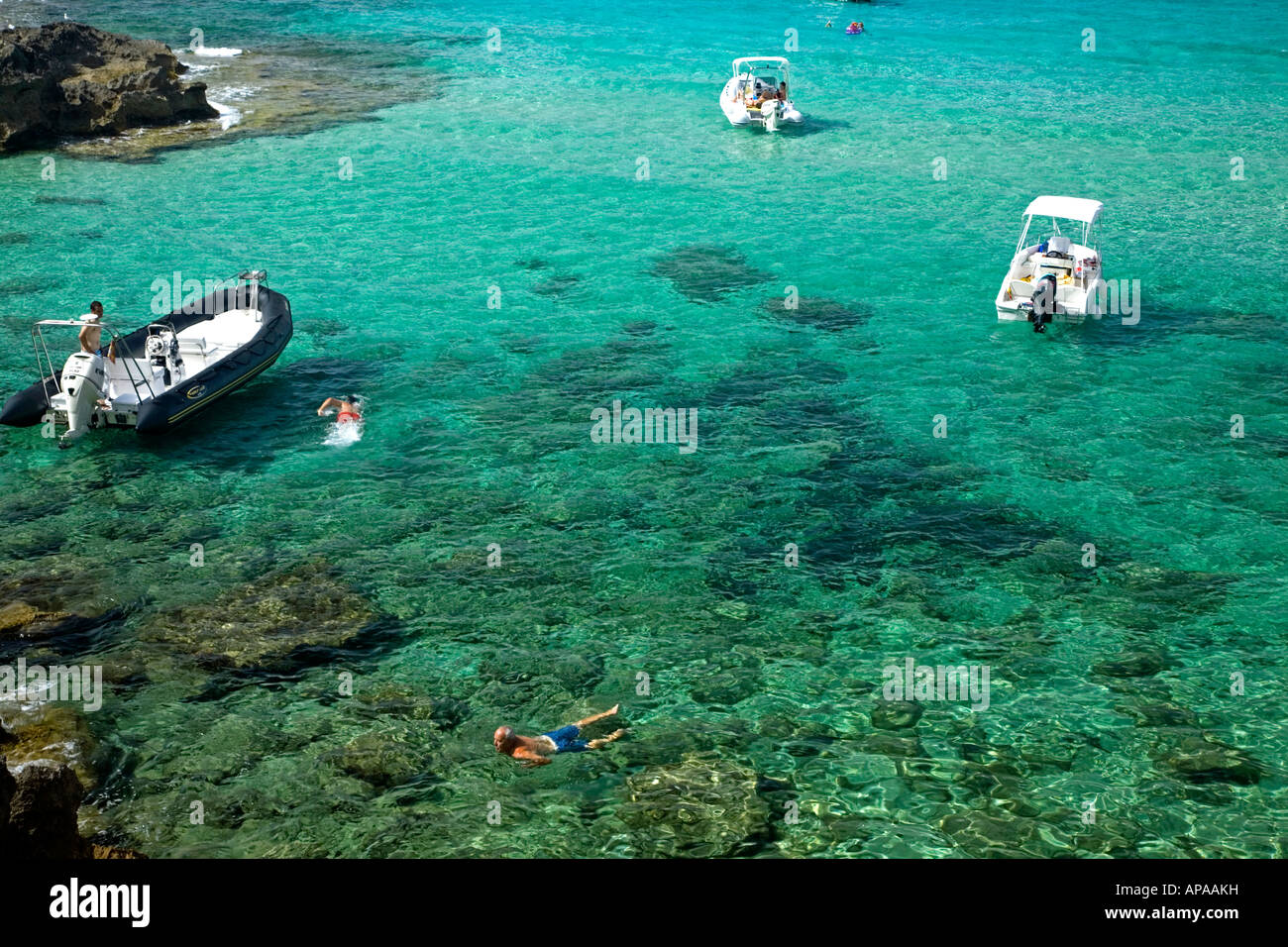 Boats and people swimming at Cala Vella. Mallorca Island. Spain Stock ...