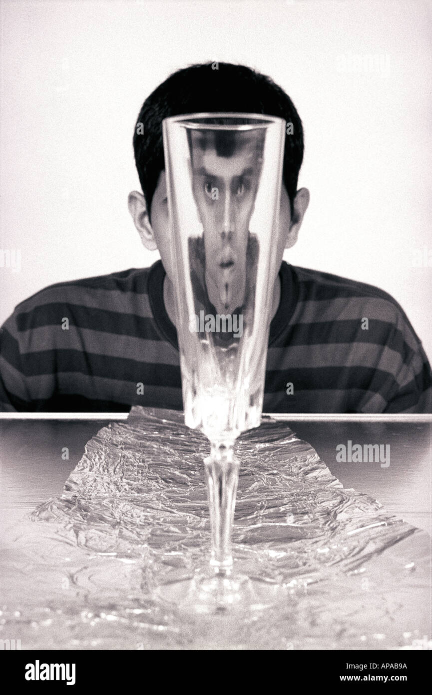 distorted boy seen through glass MR#517 Stock Photo - Alamy