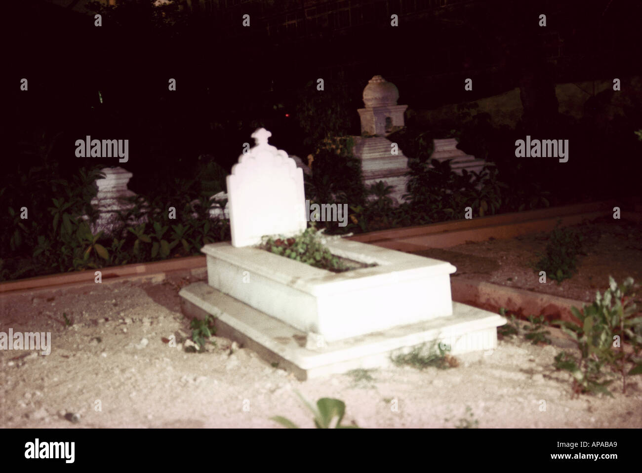 Night scene grave yard tomb stone India Stock Photo - Alamy