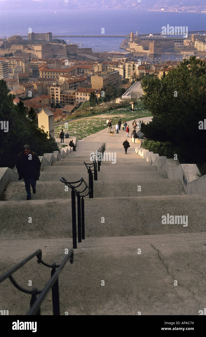 Stairs down from Notre Dame De La Garde Basilica with the Old Port and ...