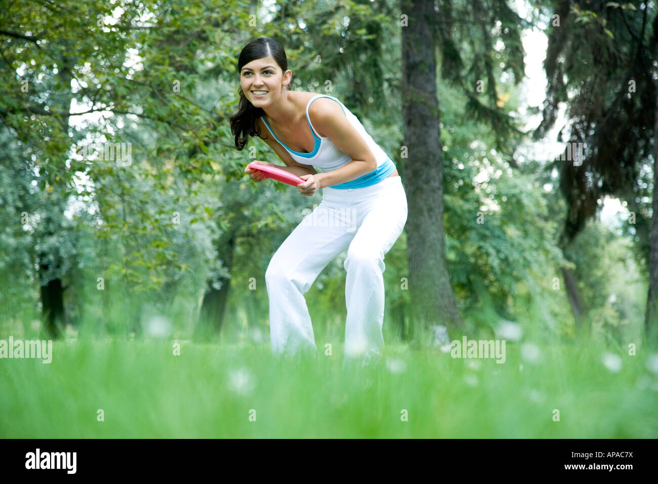 Woman and frisbee hi-res stock photography and images - Alamy