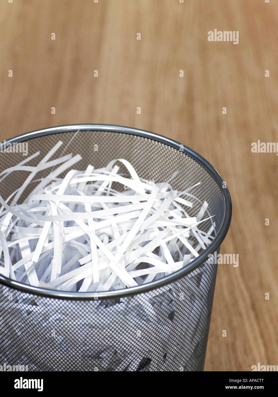 wire bin with shredded paper Stock Photo - Alamy