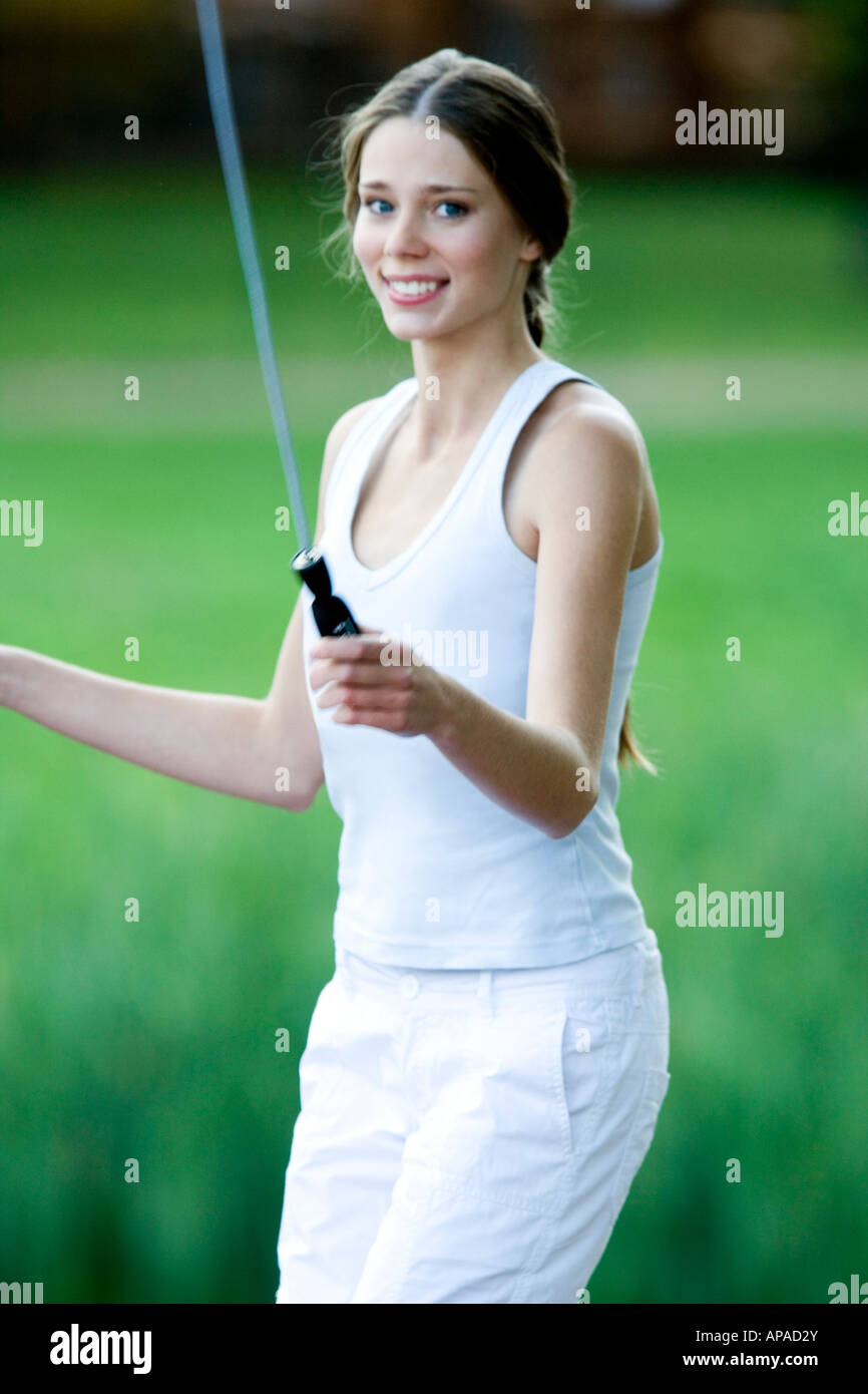woman jumping on a jump rope Stock Photo - Alamy