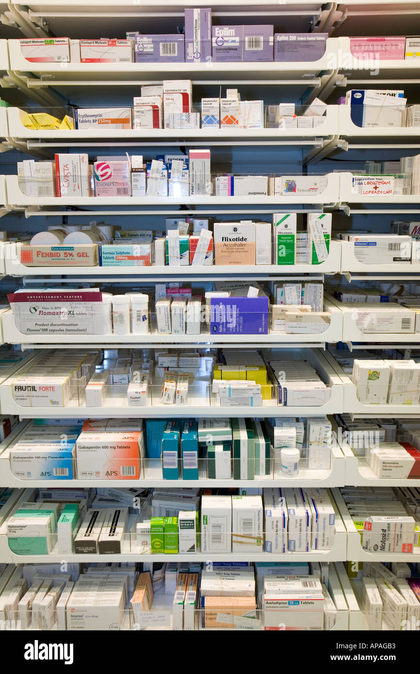 Display of pharmacy shelving in UK pharmacy Stock Photo - Alamy