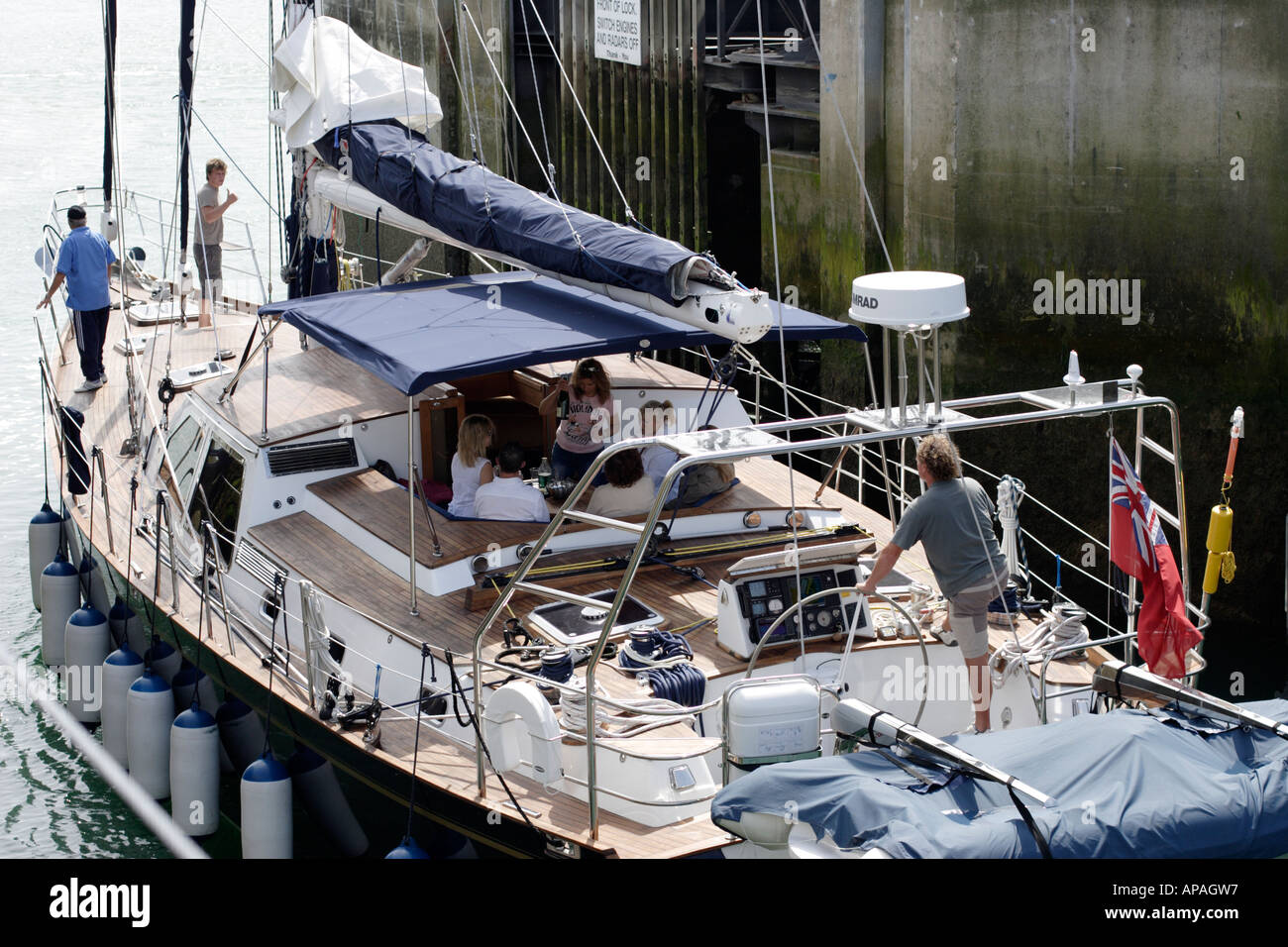 Ocean going yaucht leaving marina locks Stock Photo - Alamy