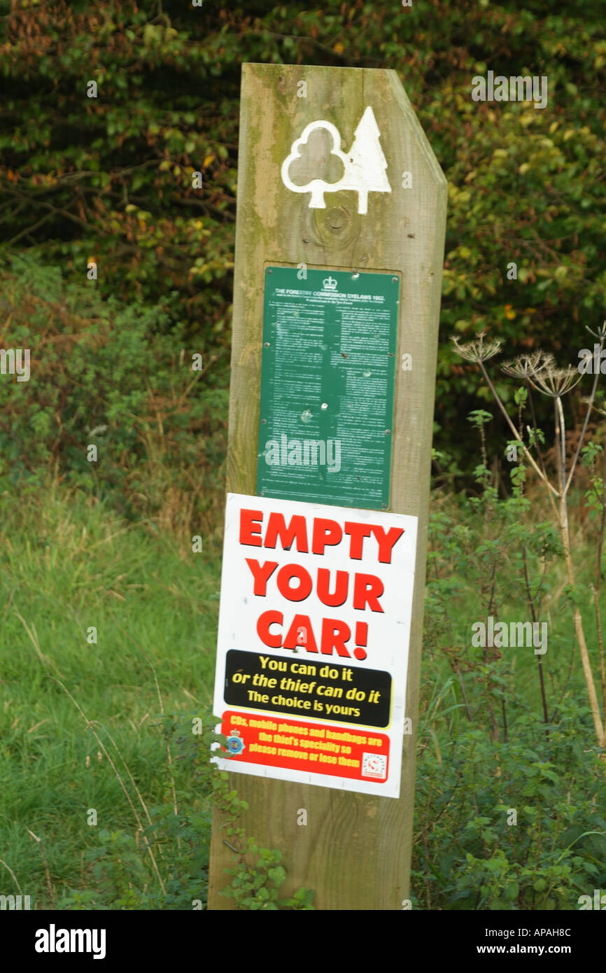 Rural countryside car park Empty Your Car warning signs Dorset southern ...