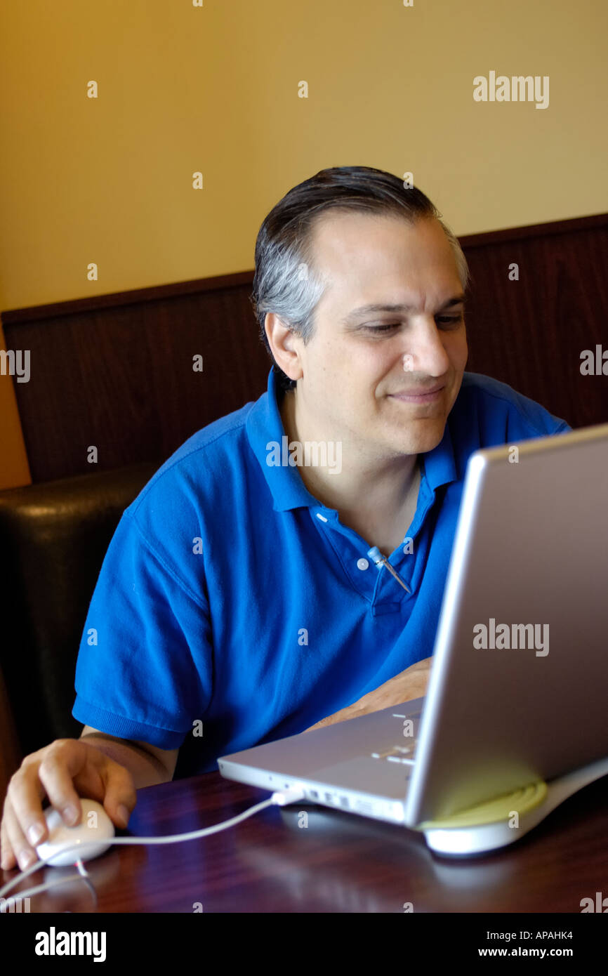 Using an apple mouse hi-res stock photography and images - Alamy