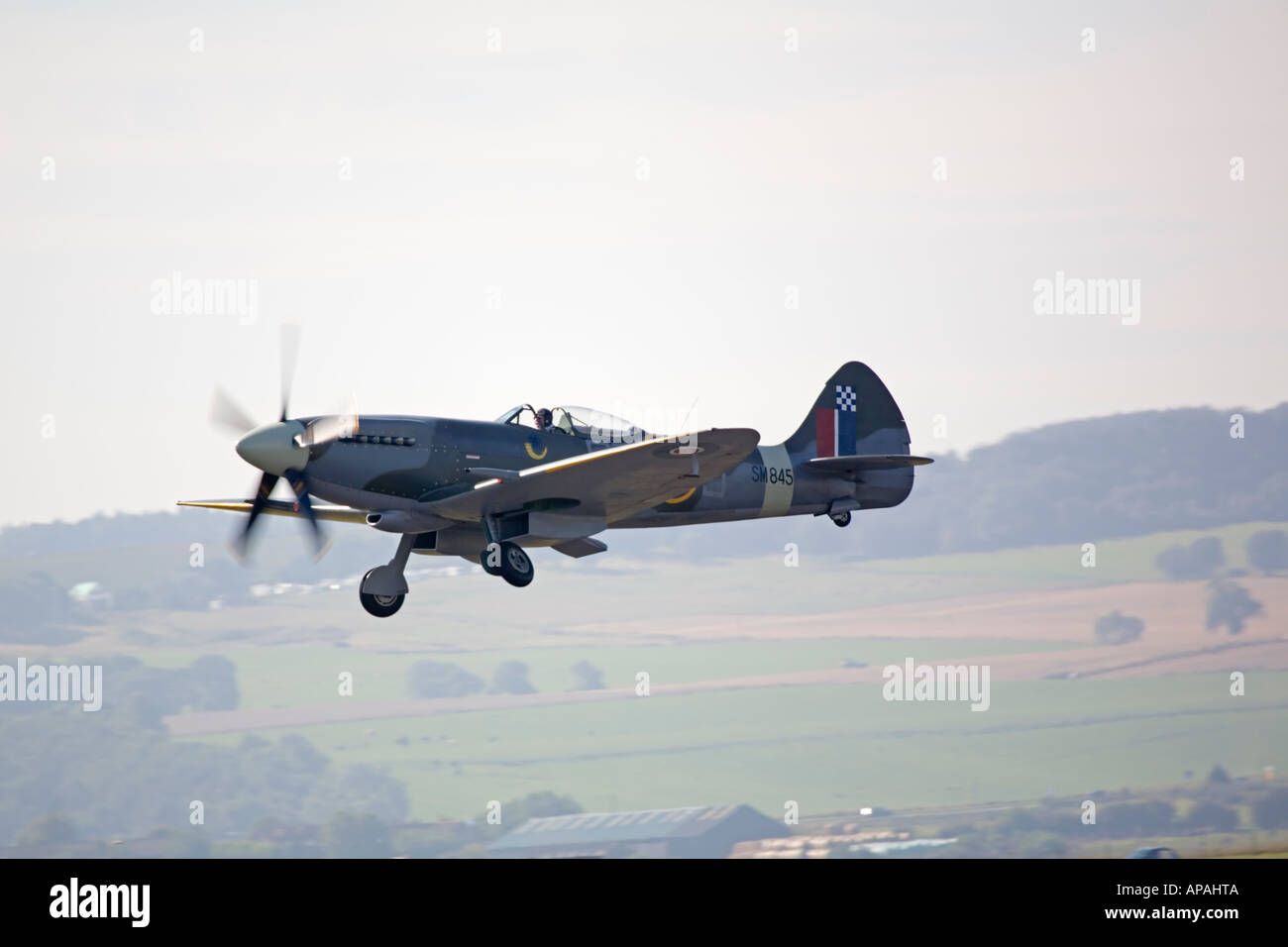 RAF Spitfire XVIII in 32 Squadron colours taking off wheels up Stock ...