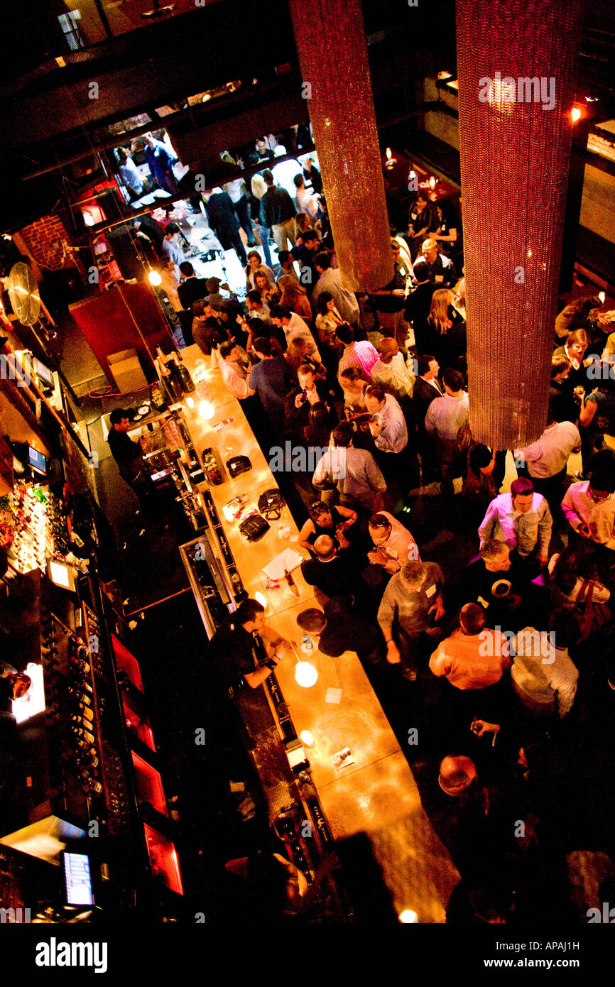 People at a nightclub mixer, talking and networking Stock Photo - Alamy