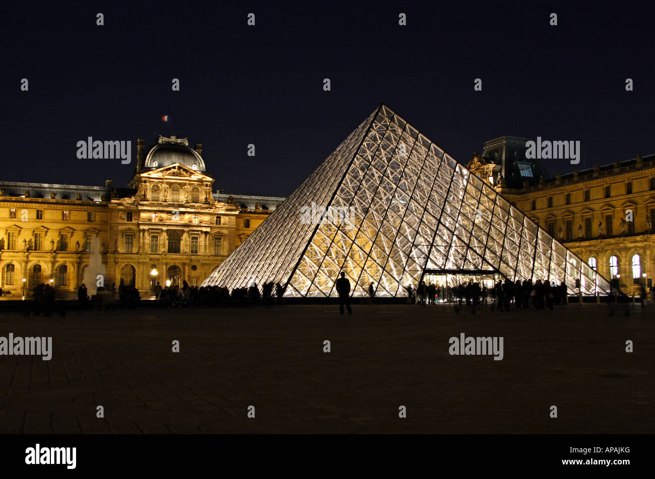 Front view of the Louvre in Paris by night Stock Photo - Alamy