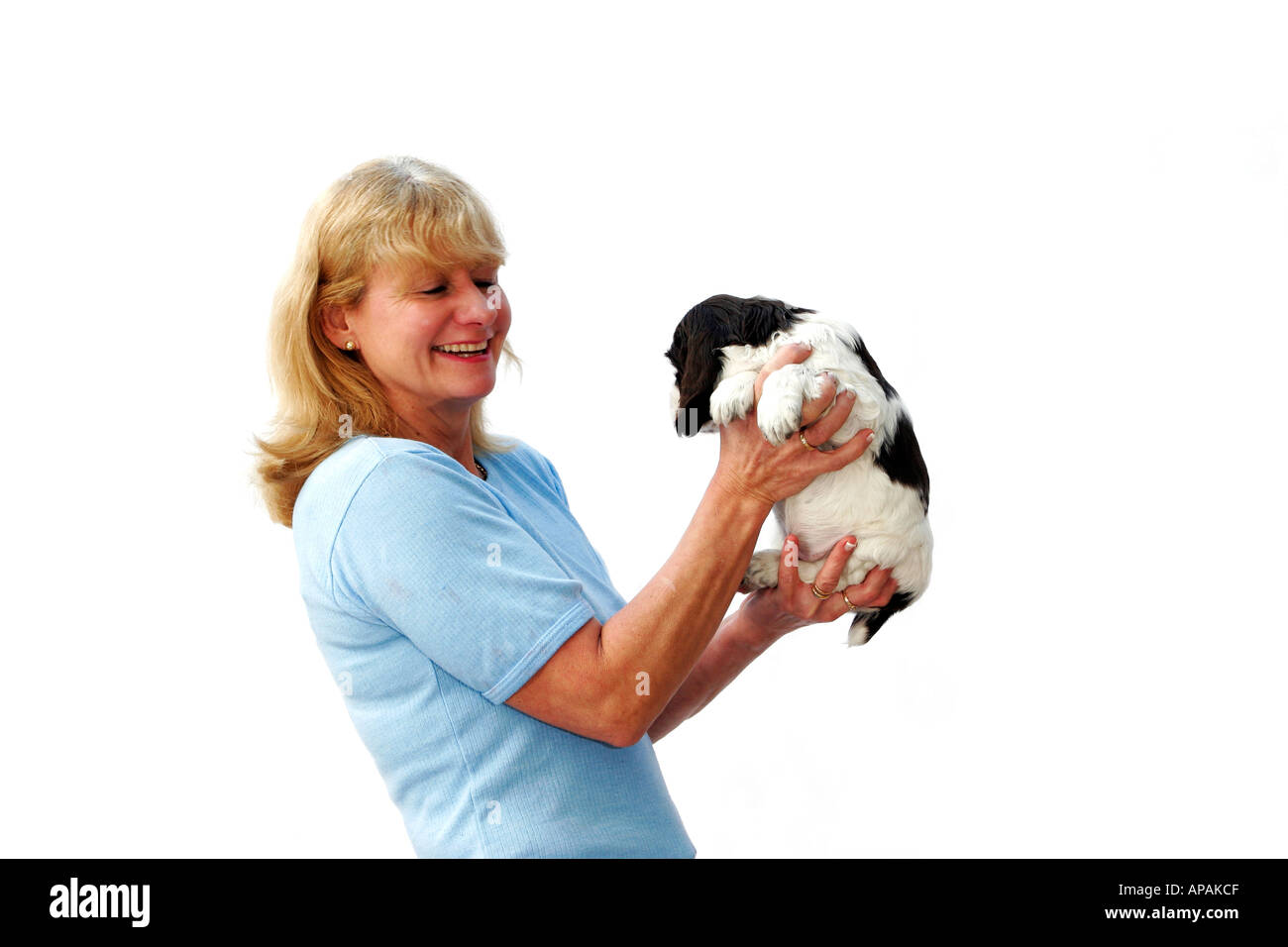 Woman nursing puppy hi-res stock photography and images - Alamy