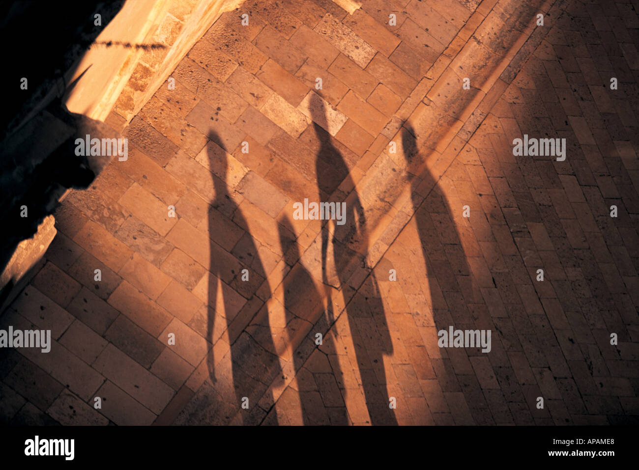 Long shadows people above street hi-res stock photography and images ...