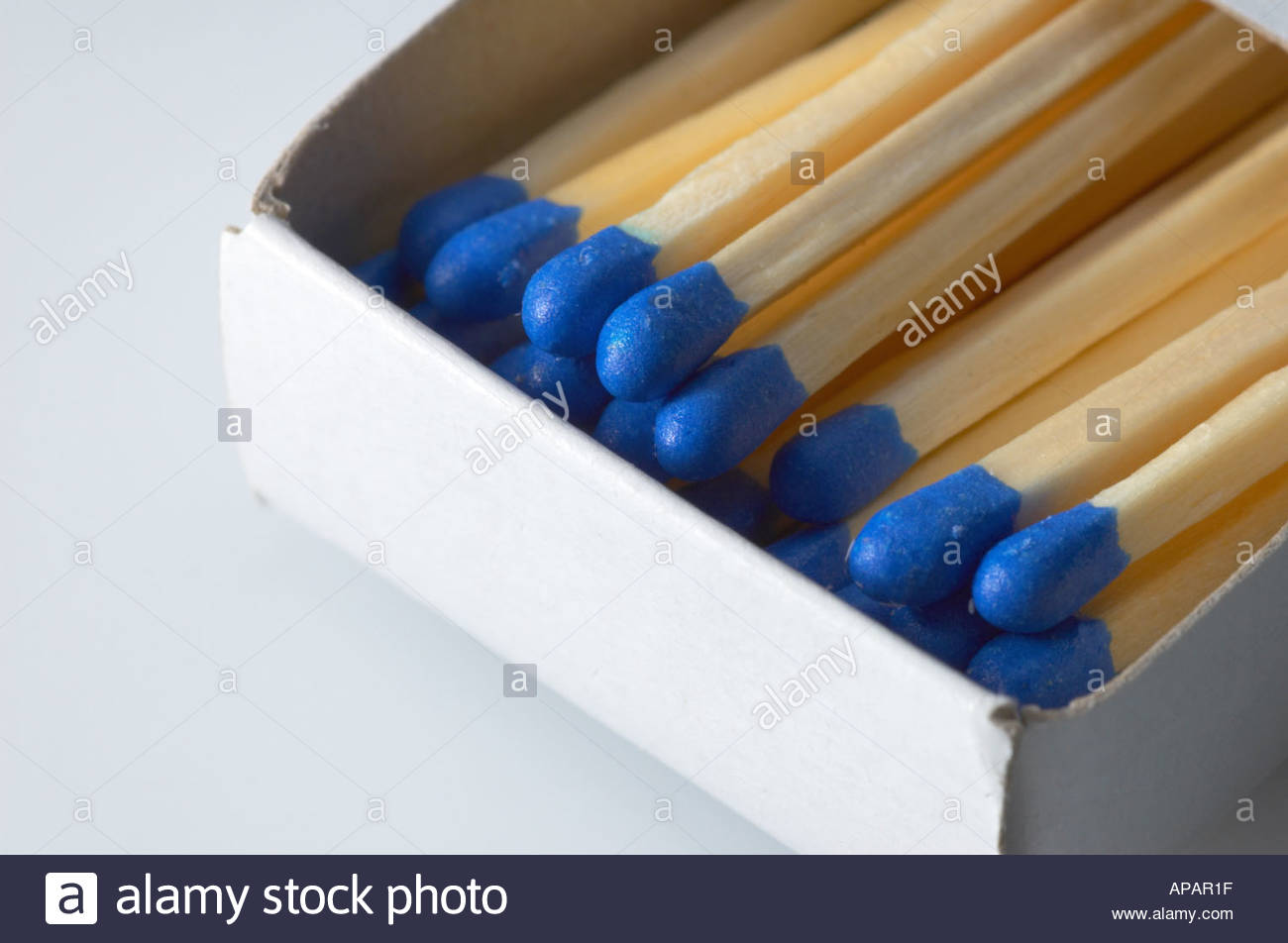 A box of blue tipped matches Stock Photo - Alamy
