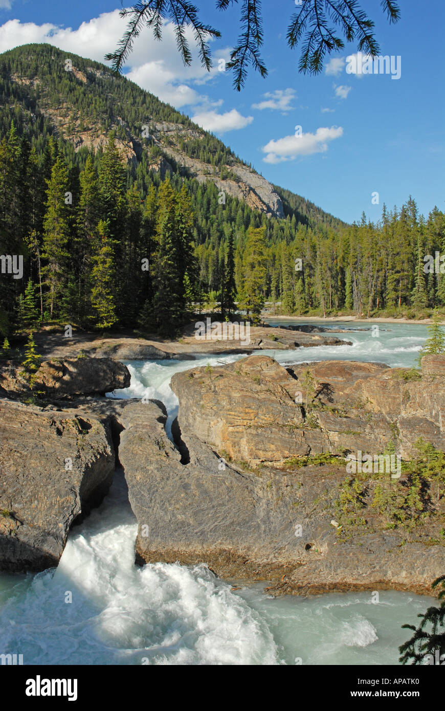 Glacier fed river plunges through a hole in the rock – Natural Bridge ...