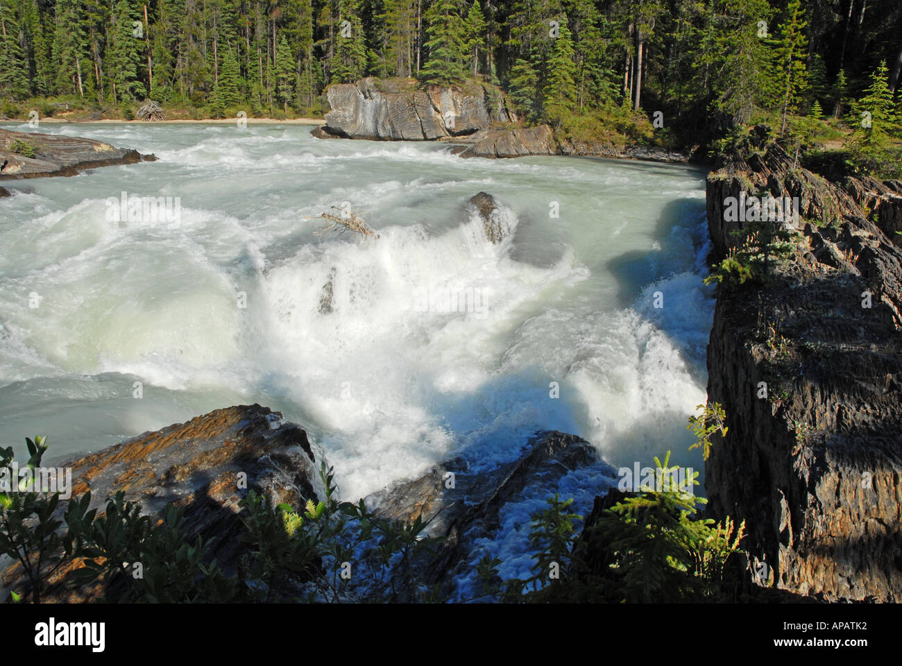 Glacier fed river plunges down a sinkhole in river – Natural Bridge ...