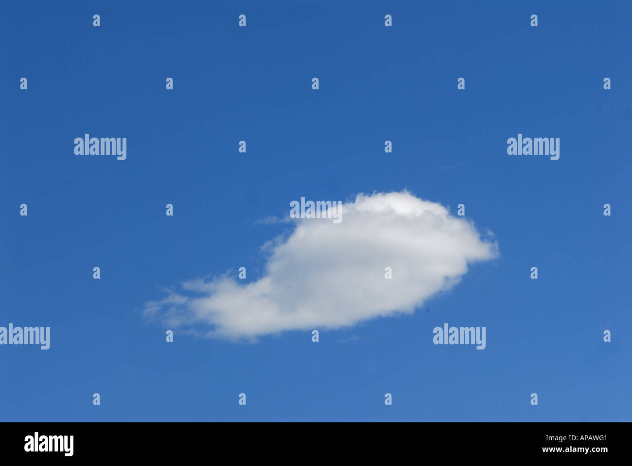 A single cloud in a blue sky Stock Photo - Alamy