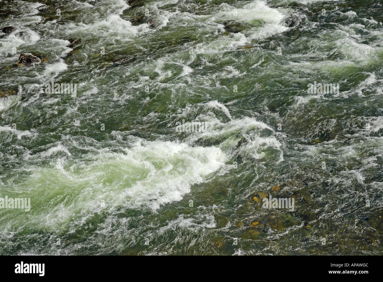 Pattern of turbulent water in river Stock Photo - Alamy