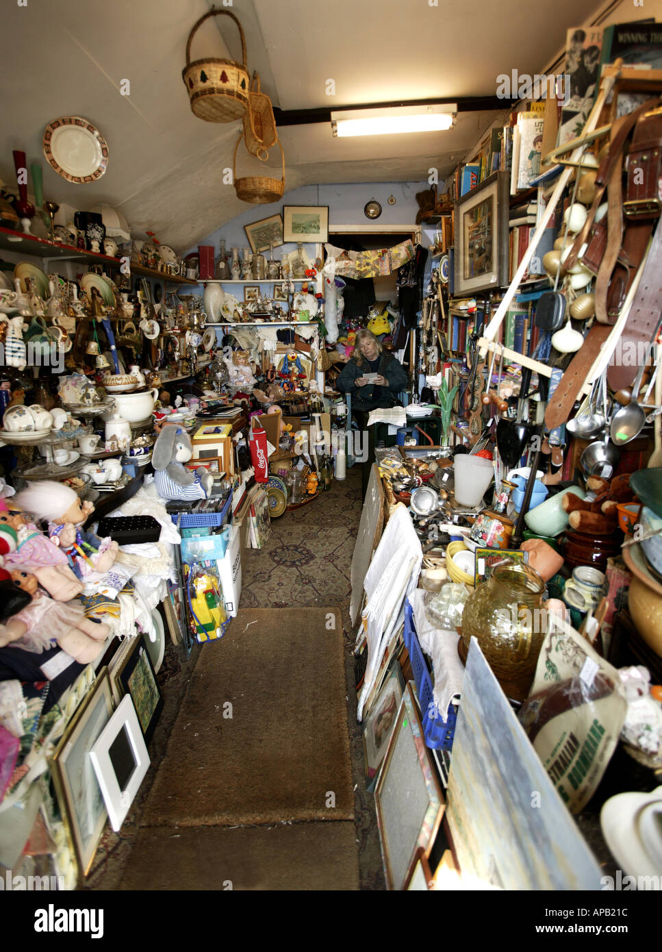 Woman hoarding stuff Stock Photo - Alamy