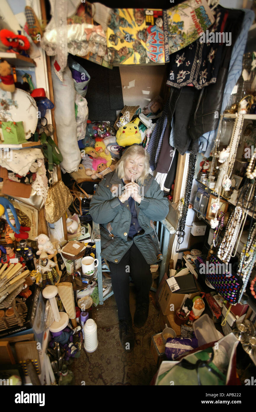 Woman hoarding stuff Stock Photo - Alamy