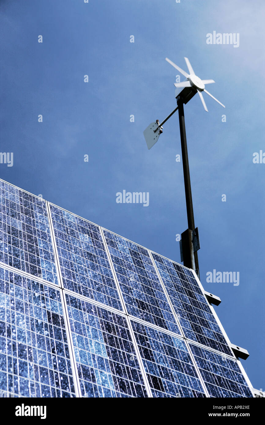 Solar panel with a windmill on top Stock Photo - Alamy