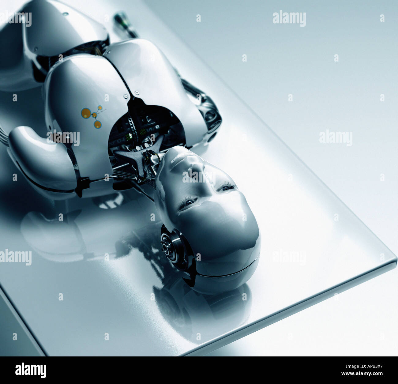A white conceptual futuristic female robot lying down Stock Photo - Alamy