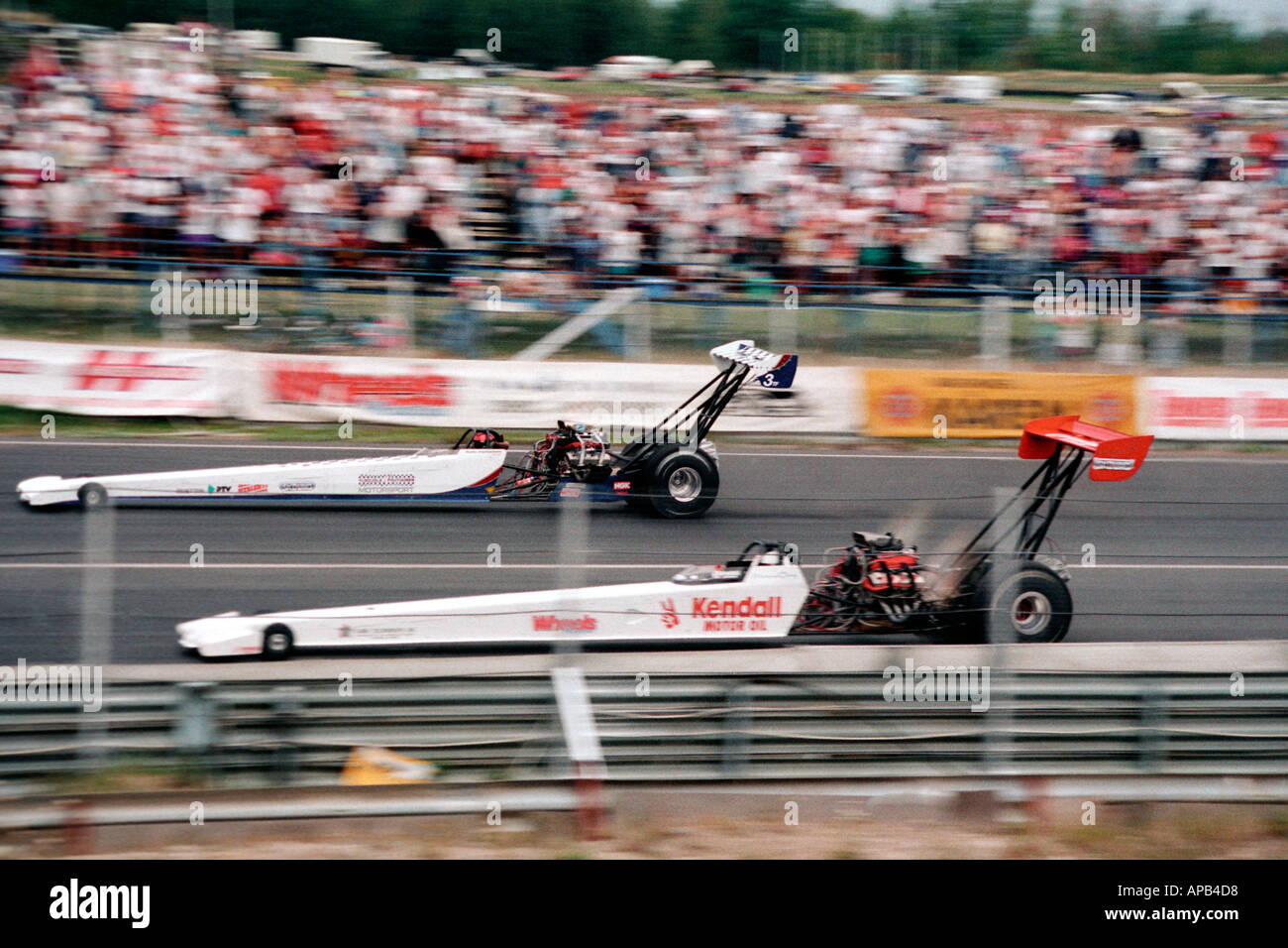 dragsters racing male interest sponsor straight line going fast quick ...