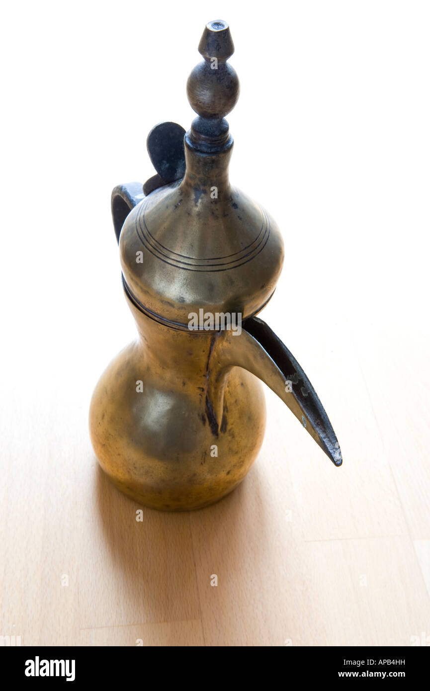traditional arabic coffee pot on contemporary wood floor background ...