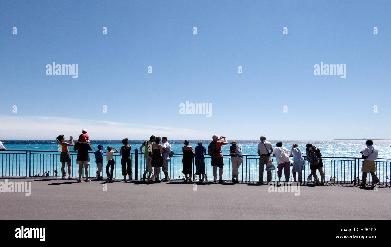 Crowd looking out to sea on Nice Promenade, France Stock Photo - Alamy