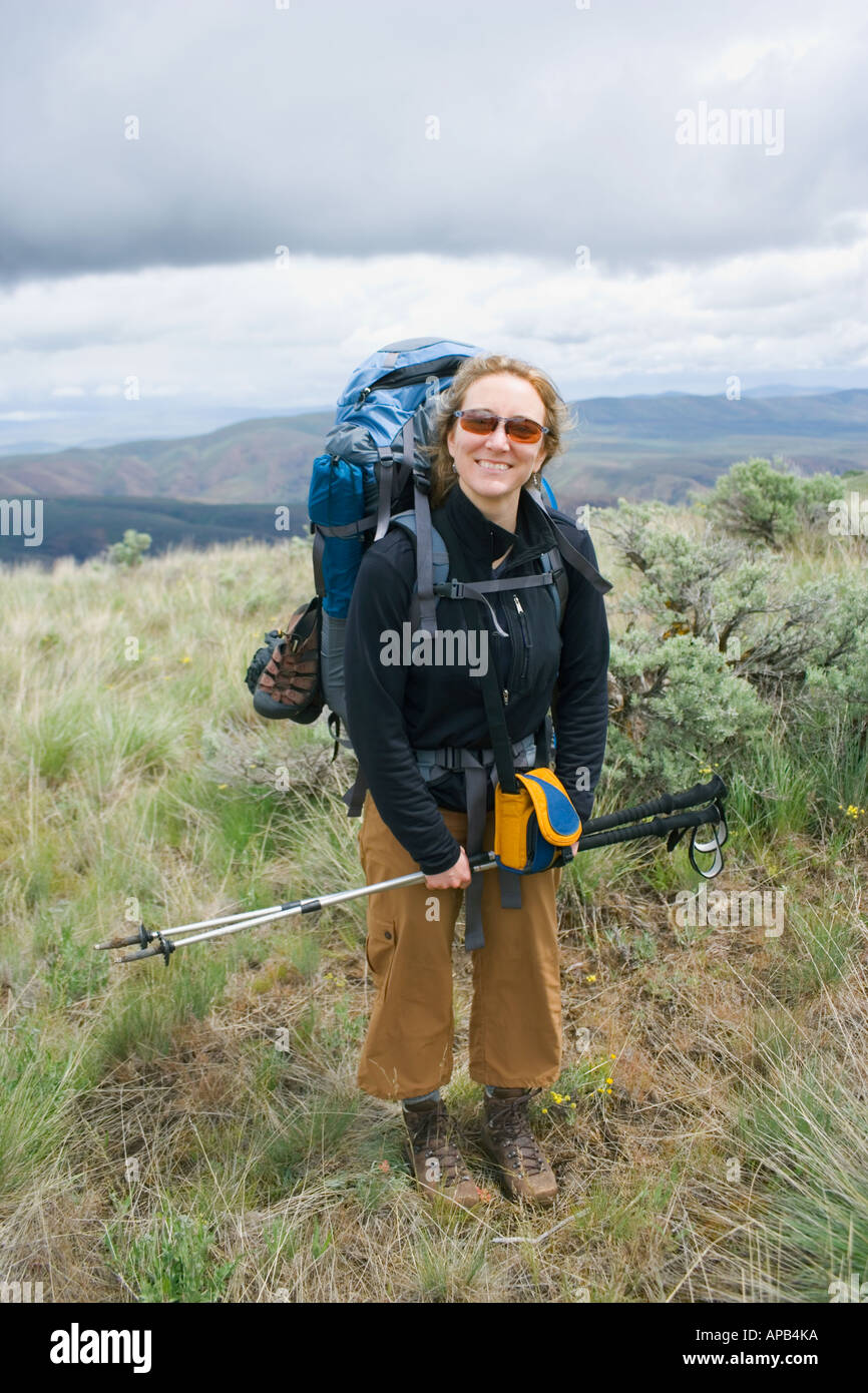 Portrait of a female backpacker in the high desert of Umptanum Ridge ...