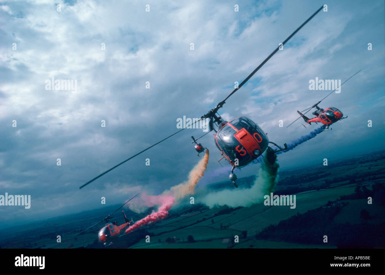 Helicopters flying in formation Stock Photo - Alamy