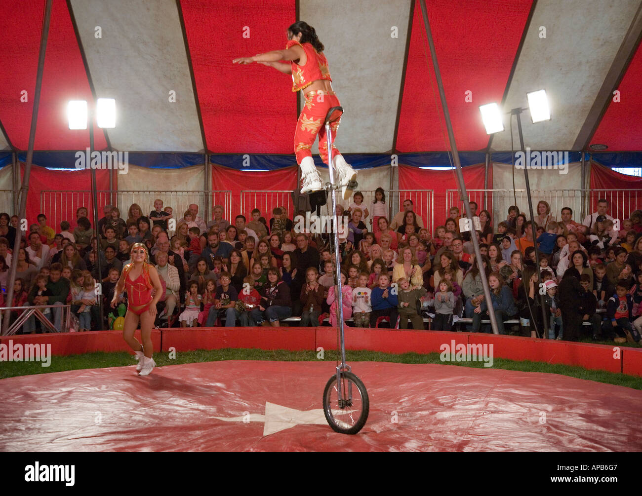 Circus performer unicycle balance hi-res stock photography and images ...