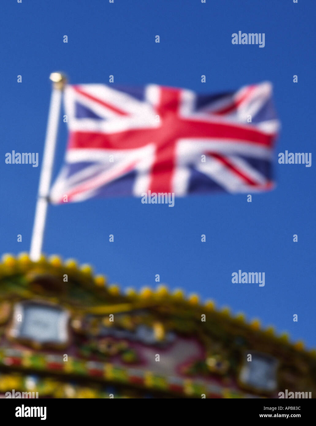 blurred union jack flag blowing in the breeze Stock Photo - Alamy