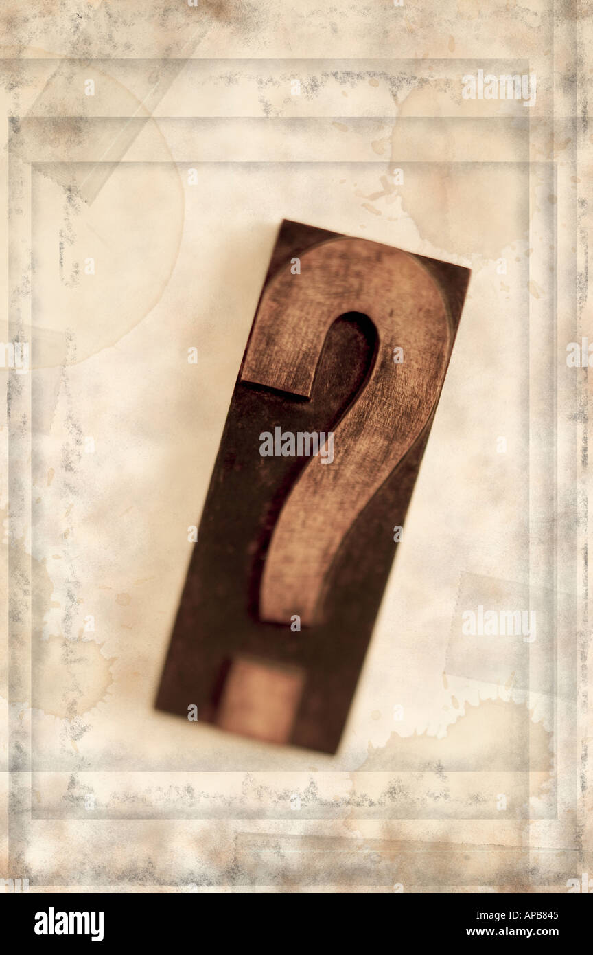 Wooden block with question mark symbol Stock Photo - Alamy
