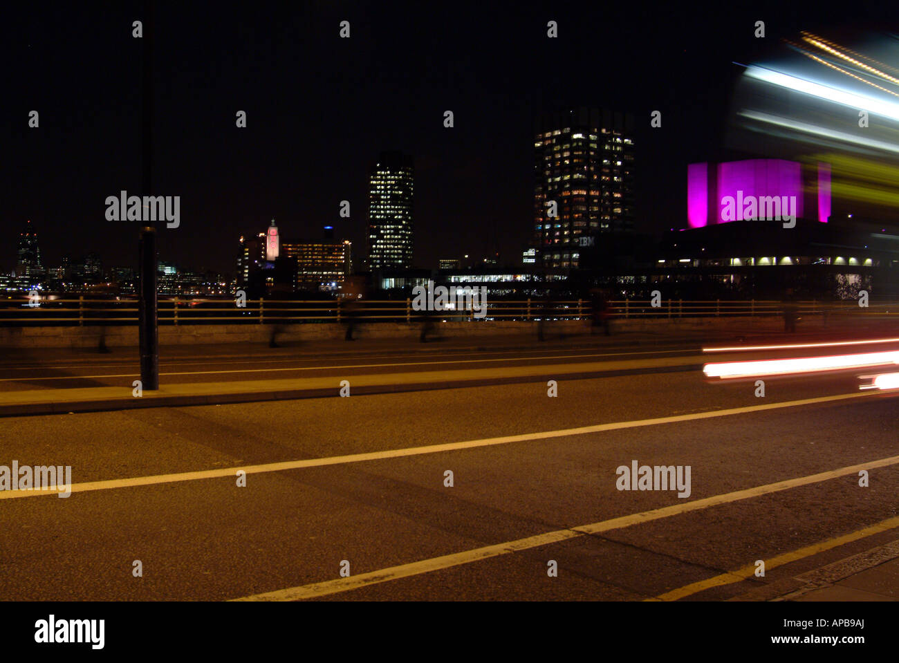 Waterloo Bridge shot at night with a slow shutter speed capturing the ...
