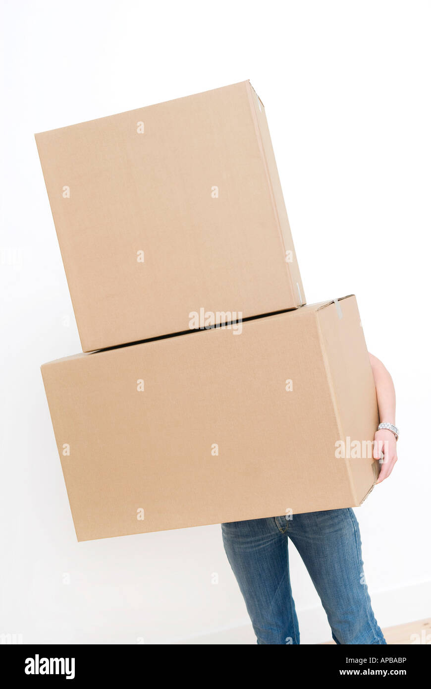 young female carrying cardboard boxes Stock Photo - Alamy