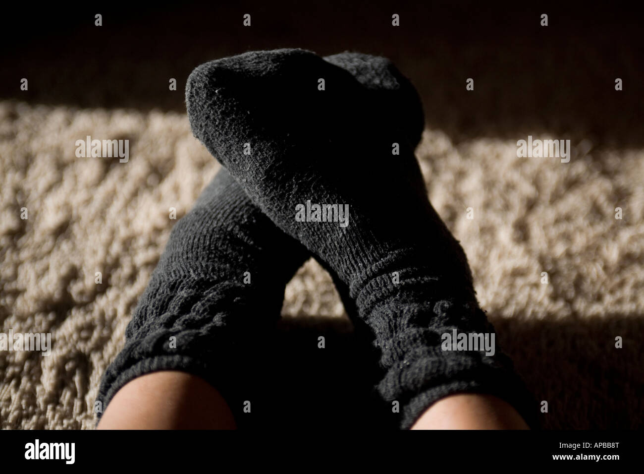 Female feet in black socks hi-res stock photography and images - Alamy